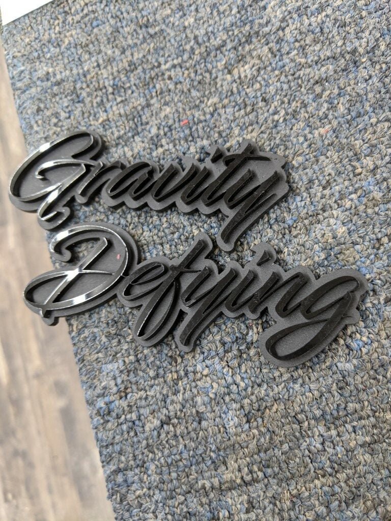 Gravity Defying Car Badge - Gloss Black On Matte Black - Script Font ...