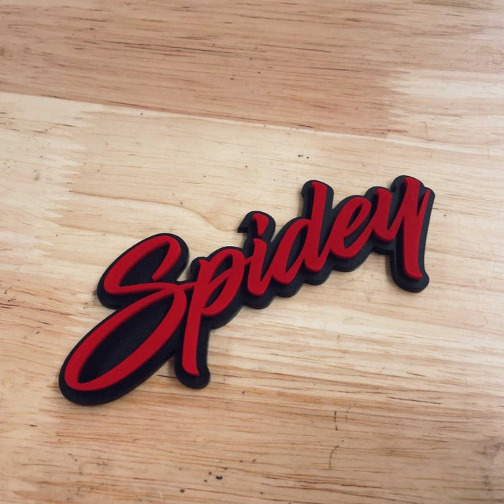 Spidey Car Badge - Red On Matte Black - Script Font – Atomic Car Concepts